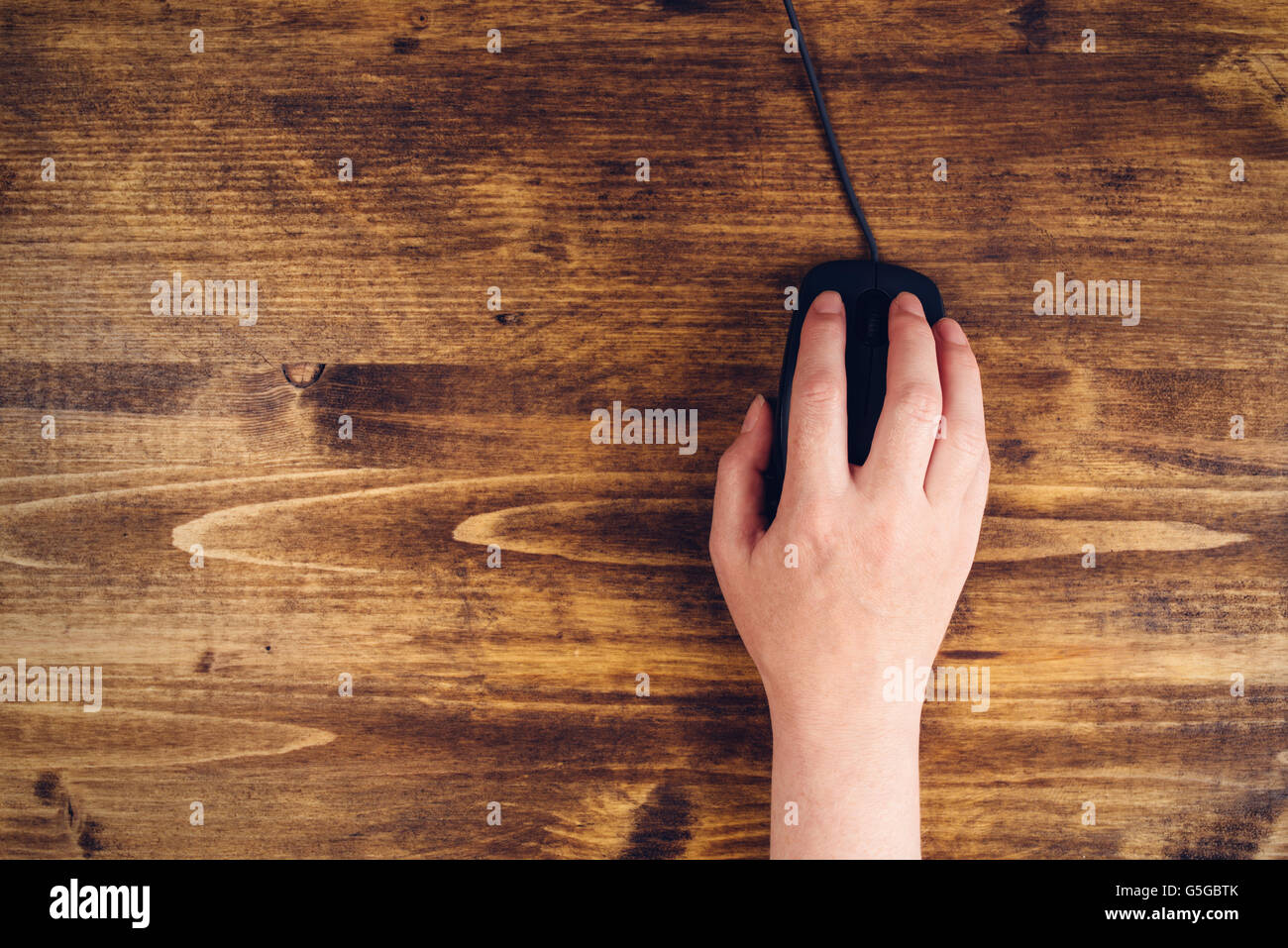 Hand on mouse of computer hi-res stock photography and images - Alamy