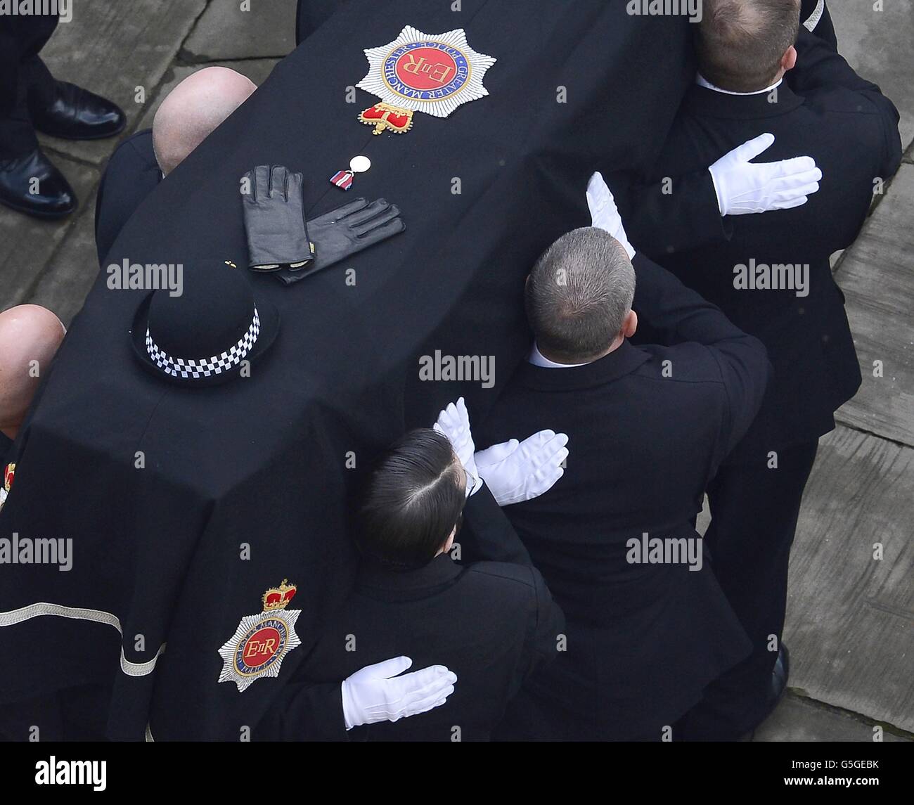 The coffin of police Constable Fiona Bone is carried into Manchester ...