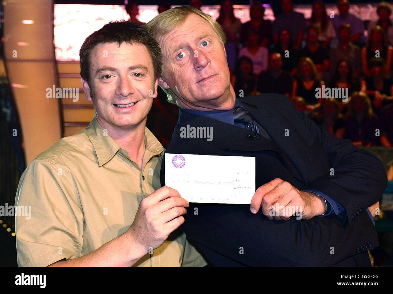 Coronation Street actor Sean Wilson (Martin Platt) with his cheque ...