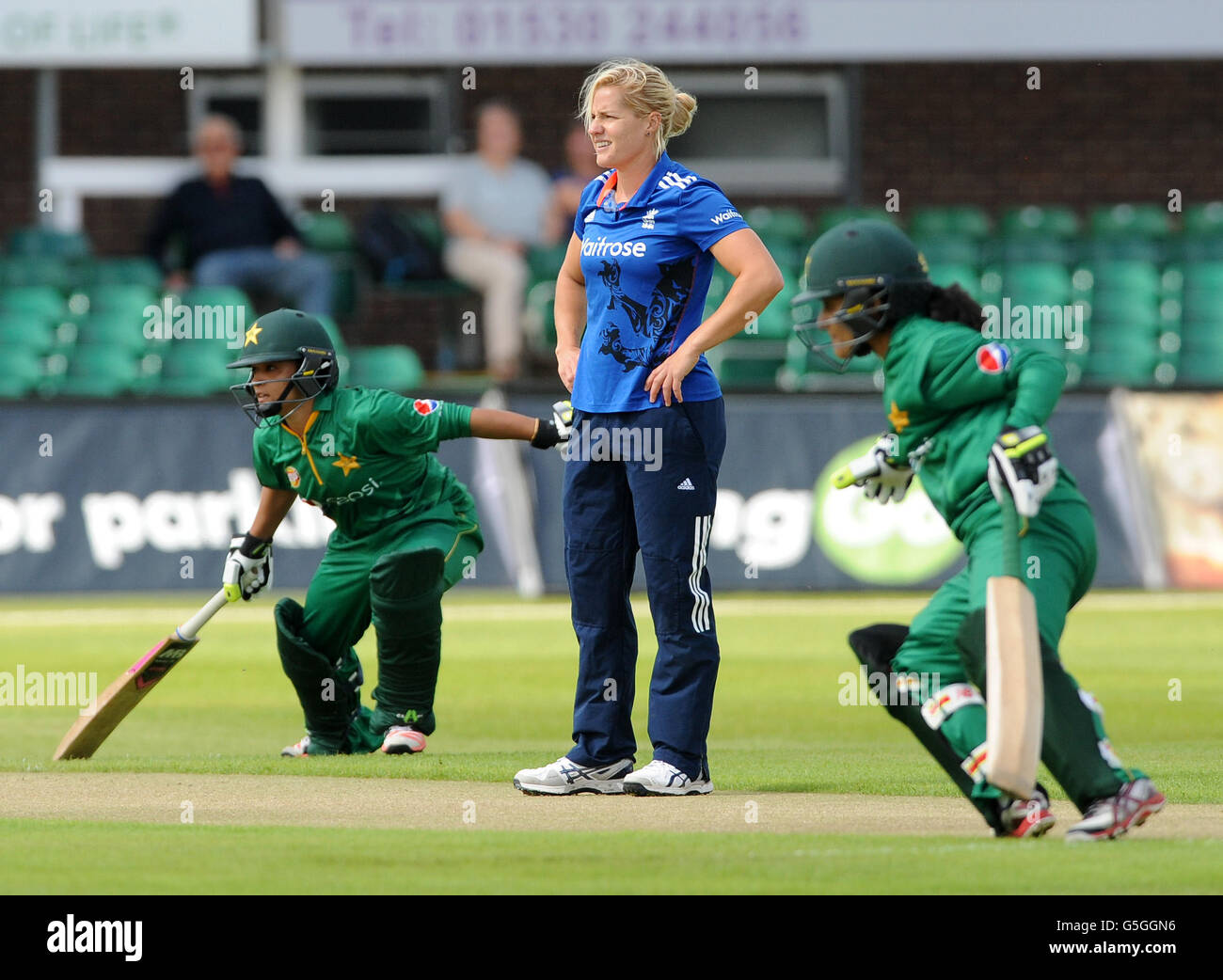 England's Katherine Brunt looks on as Pakistan's Javeria Wadood (right ...