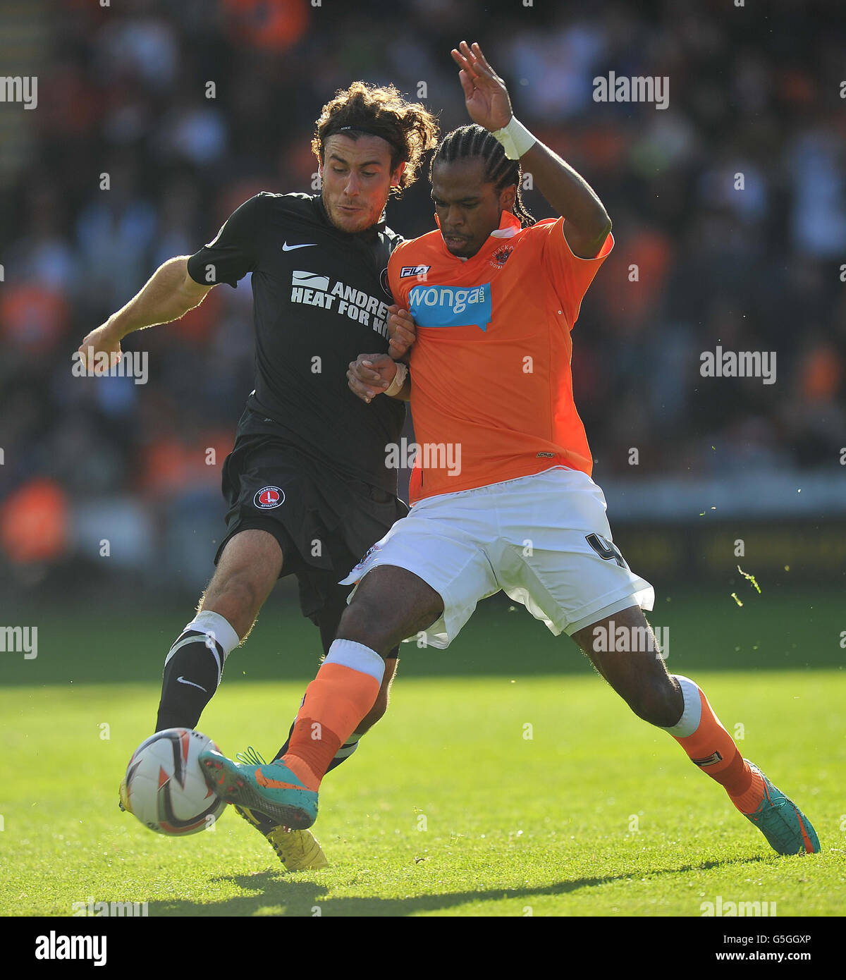Charlton Athletic's Lawrie Wilson and Blackpool's Nathan Delfouneso ...