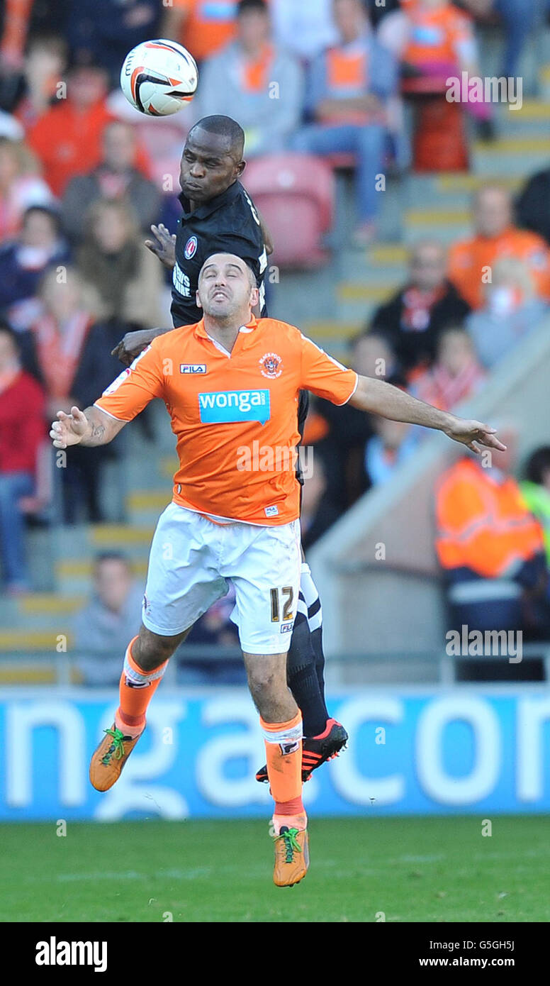 Charlton Athletic's Leon Cort out jumps Blackpool's Gary Taylor ...