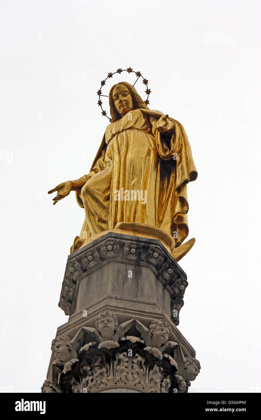 Statue of the Blessed Virgin Mary in front of the sky Stock Photo - Alamy