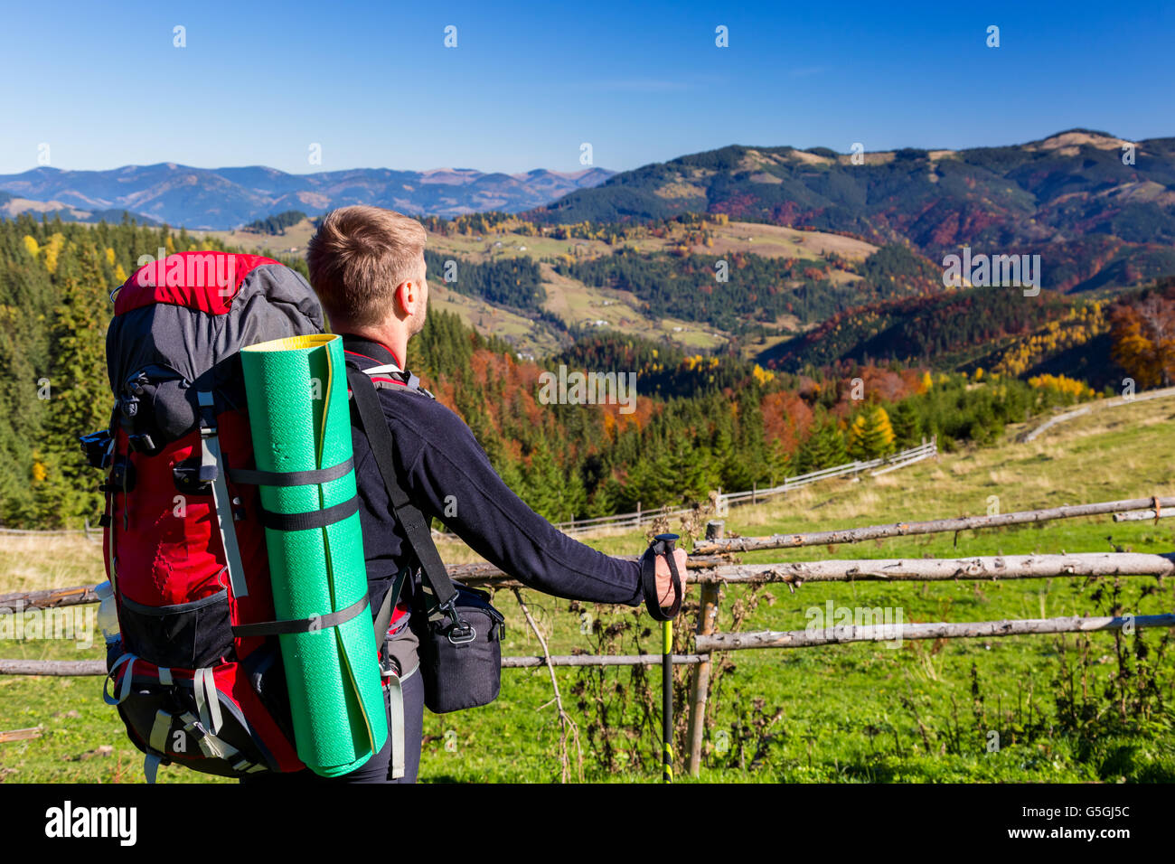 Adventure man hiking wilderness mountain with backpack, outdoor ...