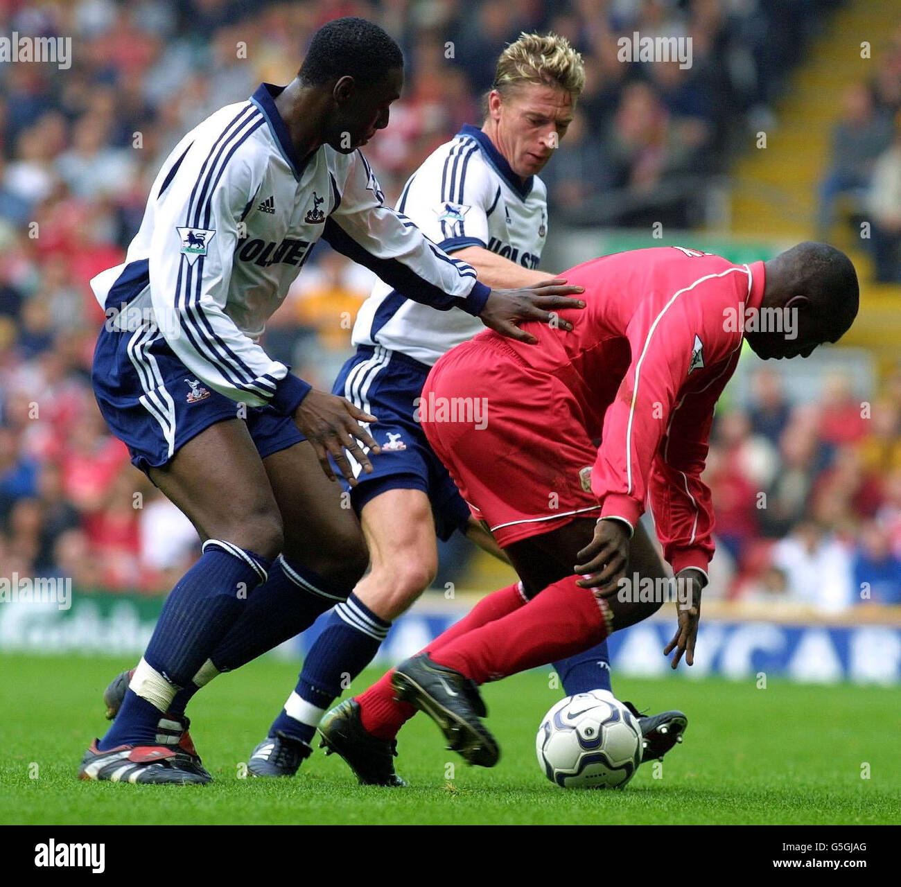 Sport football tackling emile heskey ledley king hi-res stock ...