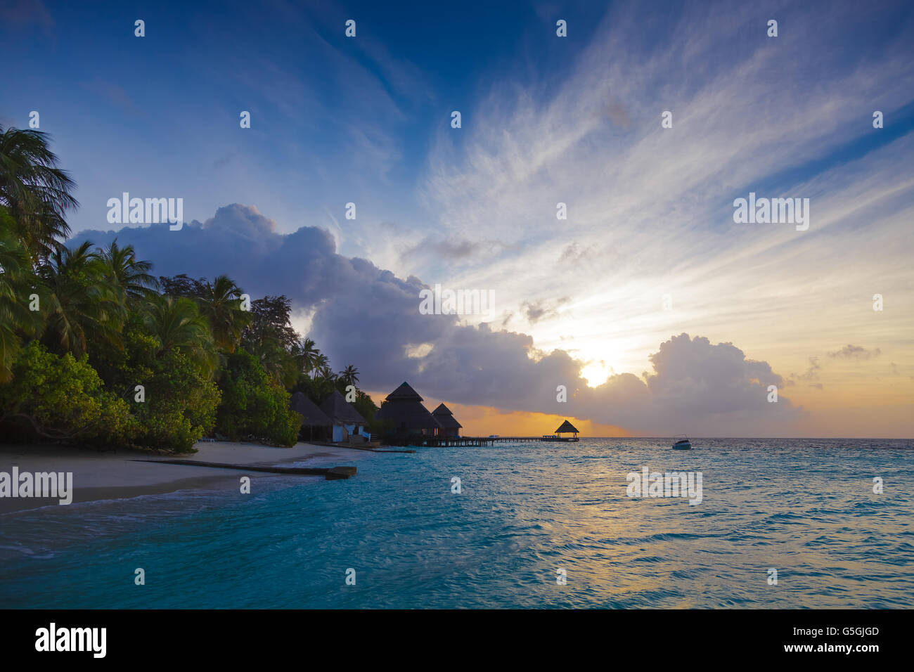 Colorful sunrise over ocean on Maldives Stock Photo - Alamy