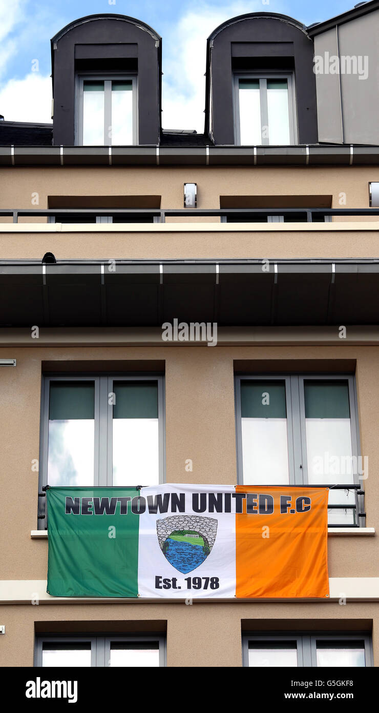 A Republic of Ireland football supporters flag tied to a hotel balcony ...