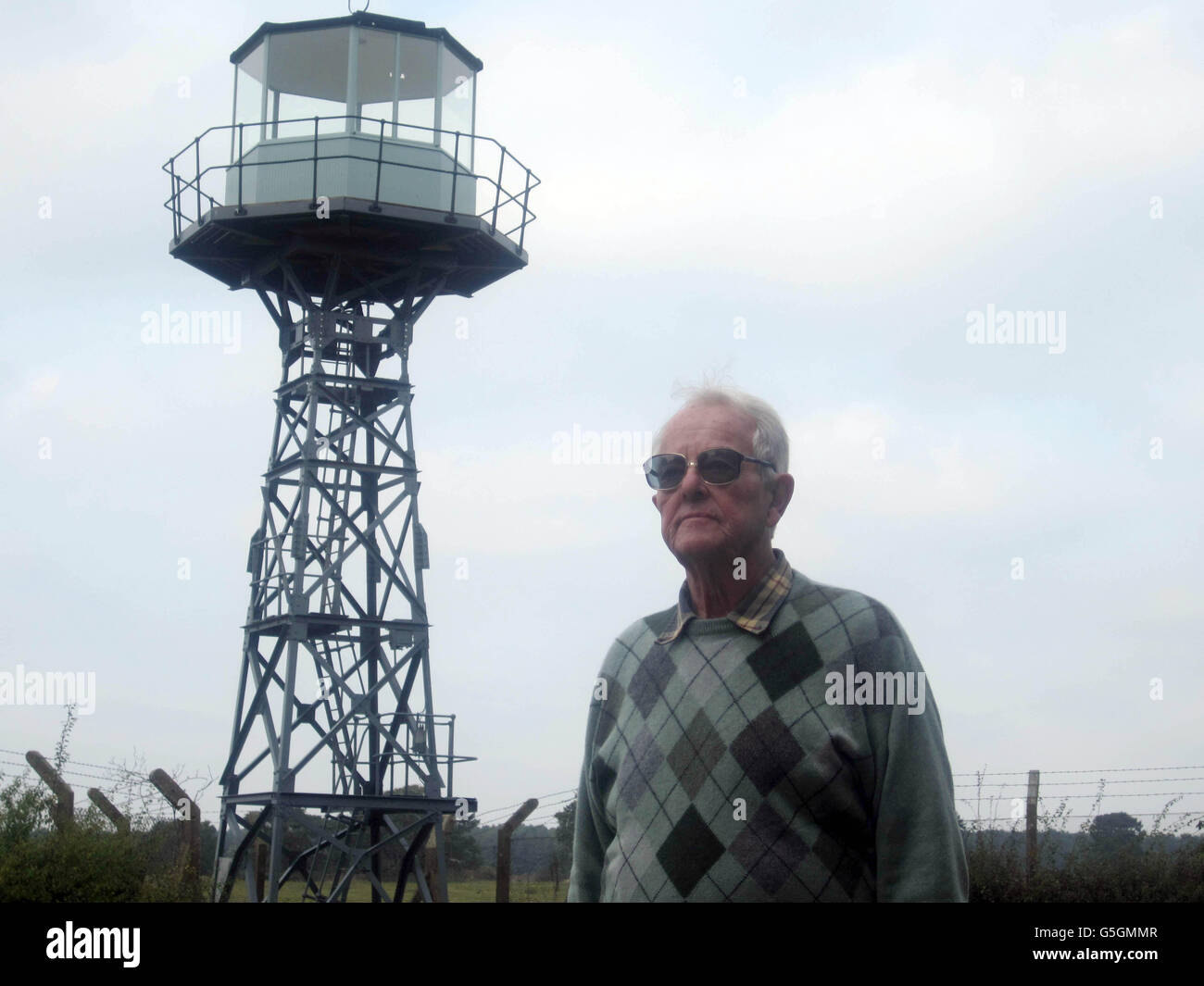 Keith Eldred, 77, stands by a watchtower at the UK's first atomic bomb ...