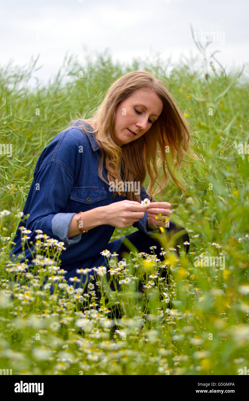 Blond woman in the British countryside Stock Photo - Alamy