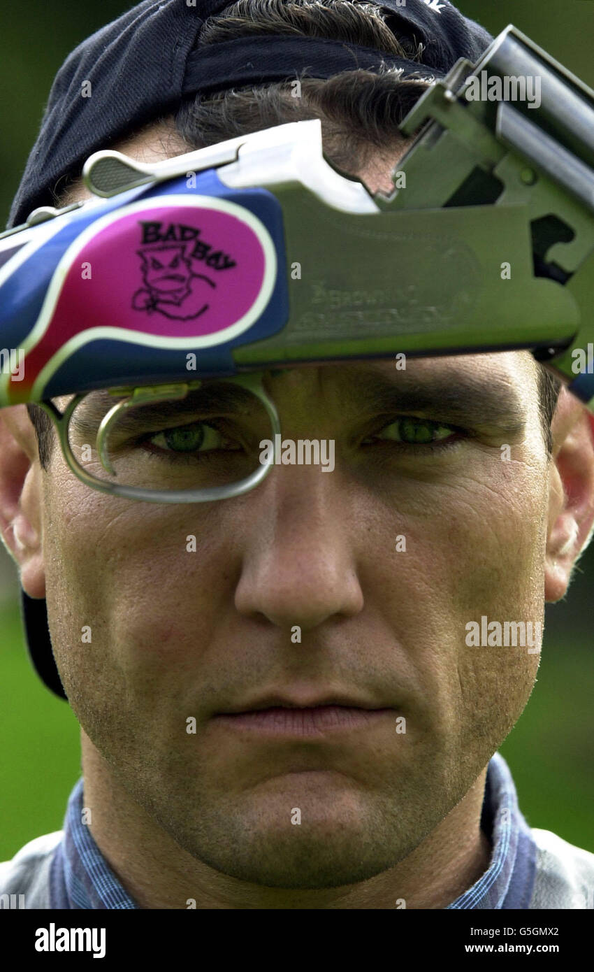 Footballer turned actor Vinnie Jones poses with his gun during the ...