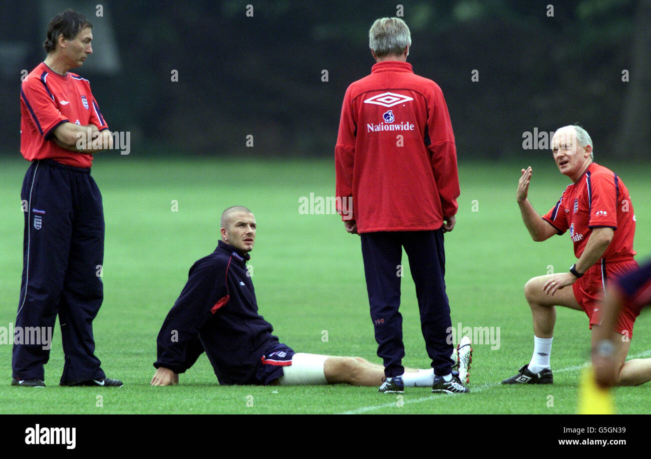 England's David Beckham warms up under the supervision of Sven Gorran ...