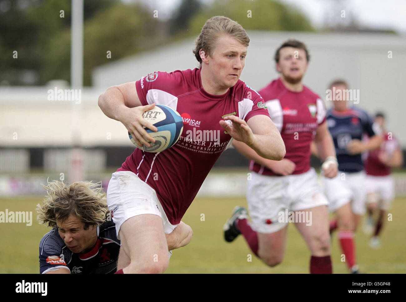 Gala's Grant Somervill (right) breaks the tackle of London Scottish's ...