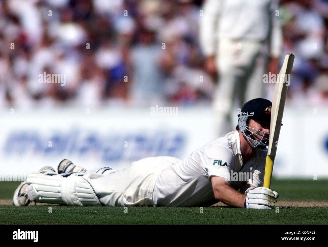 Australia's Steve Waugh salutes his 100 at the Oval cricket ground ...