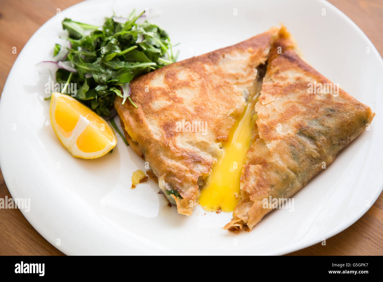 Brik, egg and tuna turnover. Tunisian food Stock Photo - Alamy