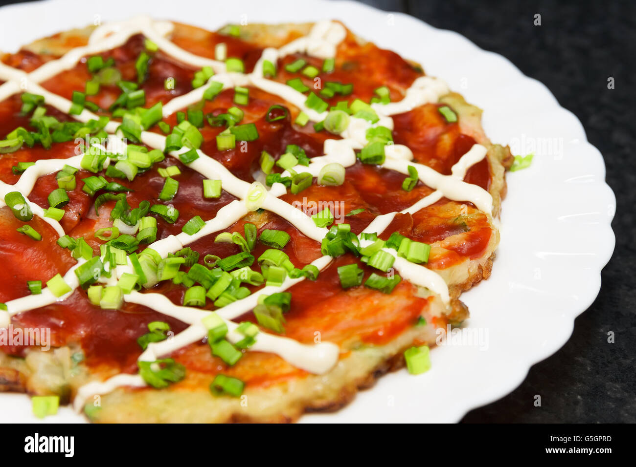 Okonomiyaki osaka style with mayonnaise hi-res stock photography and ...