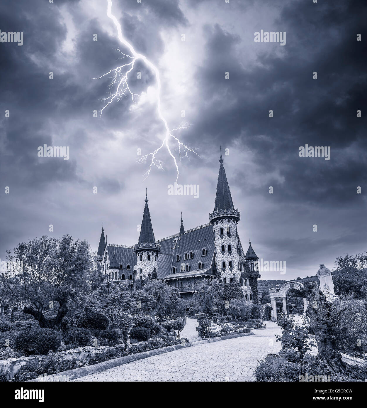 Old stone castle and lightning in the dark sky Stock Photo - Alamy
