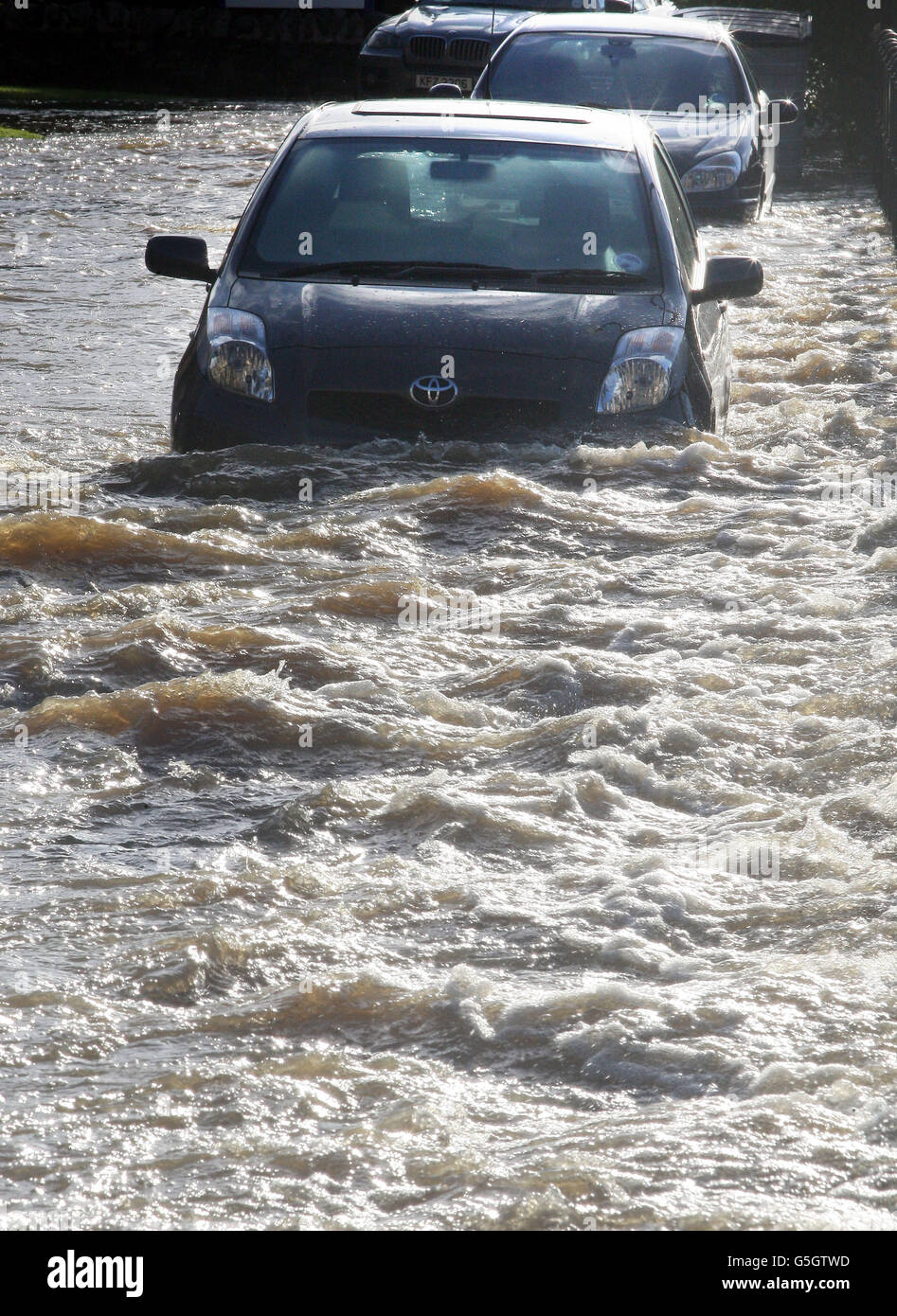 The river Tweed bursts its banks in the centre of Peebles, Scottish ...