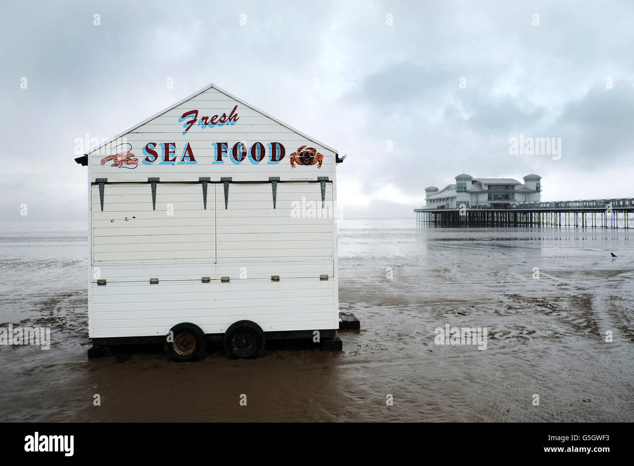 A deserted seaside food stall on a wet windy day at a seaside resort ...