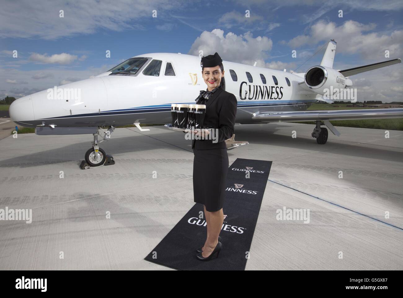 Model jj bray poses stewardess launch guinness class hi-res stock ...