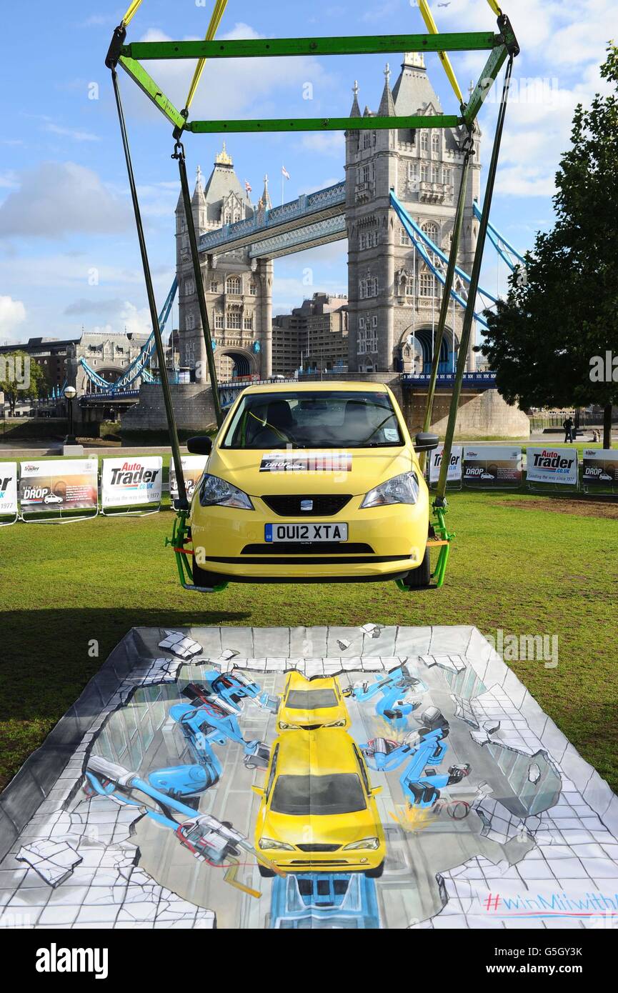 A car is suspended from a crane to celebrate Auto Trader's 35-year ...