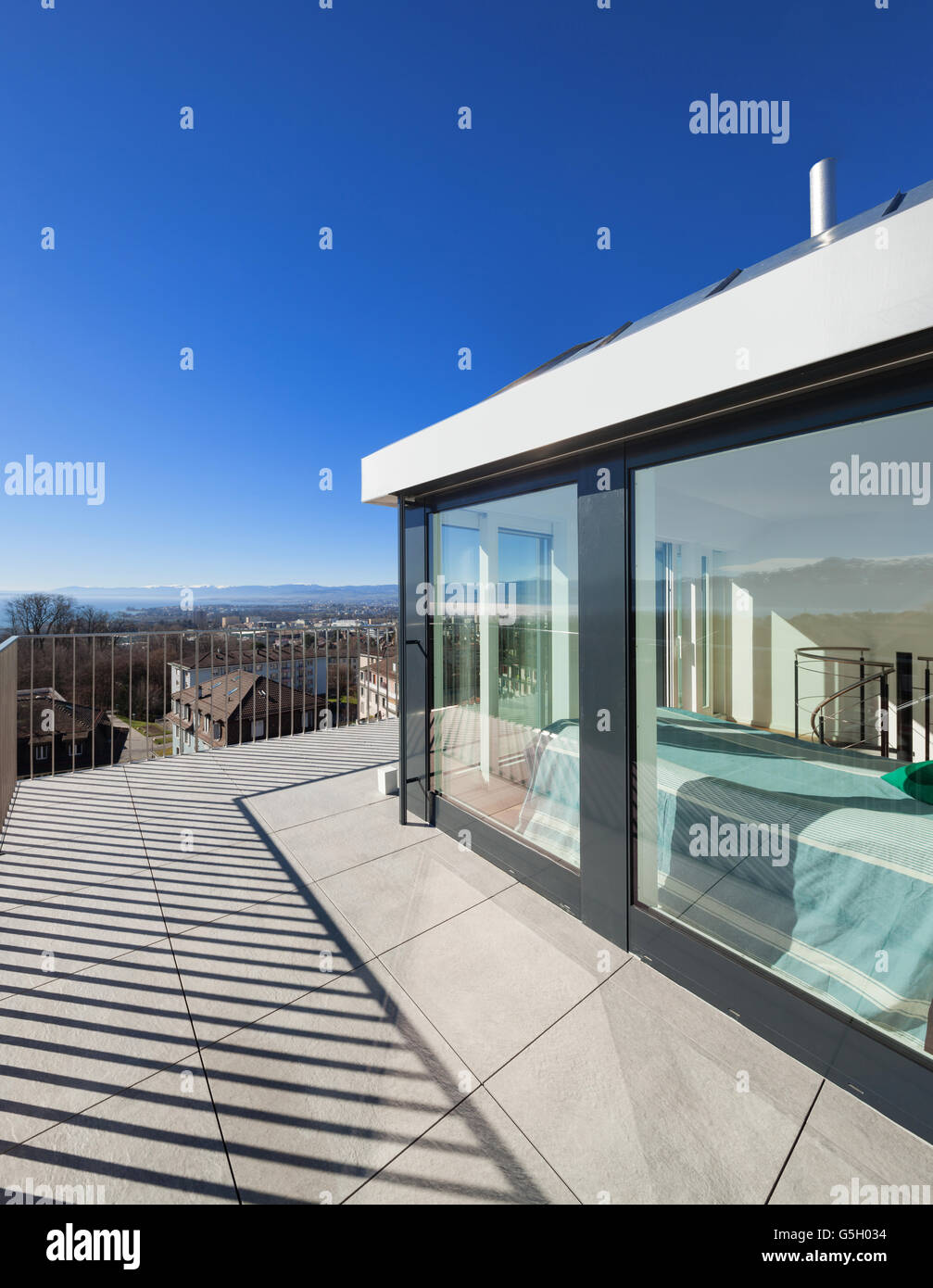 Architecture, bright terrace of a penthouse, blue sky Stock Photo - Alamy