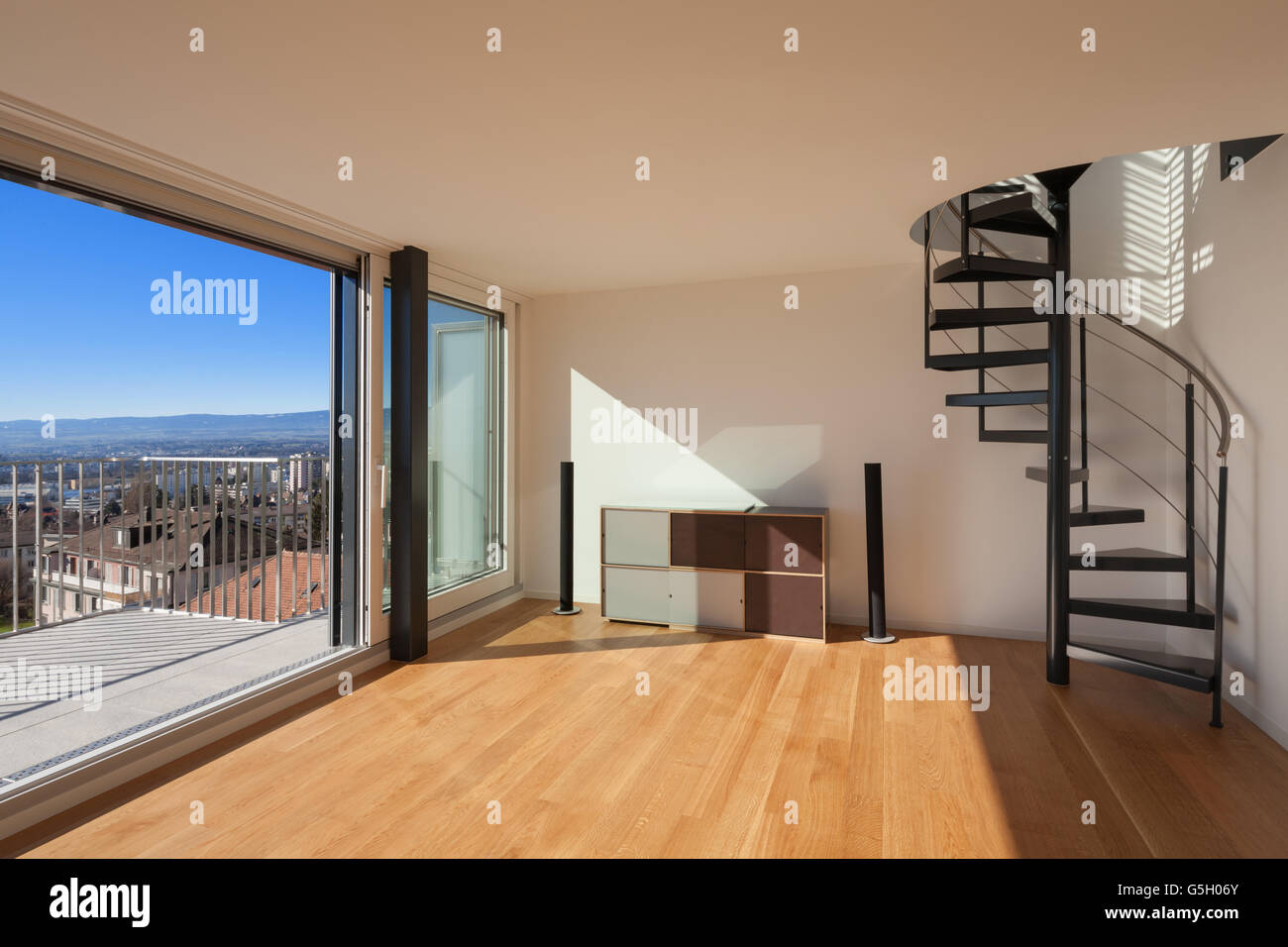 Interior, wide open space of a duplex, large window Stock Photo - Alamy