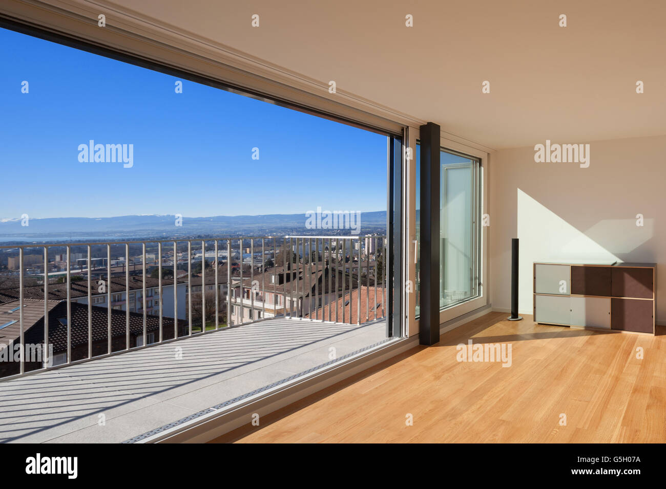 Interior, wide open space of a duplex, large window Stock Photo - Alamy