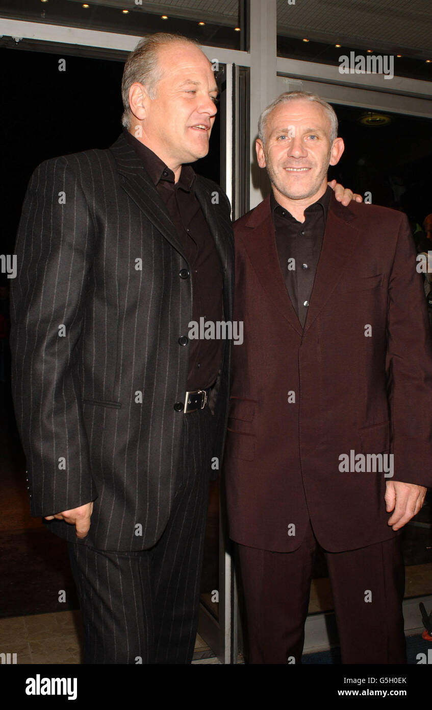 Former footballers Andy Gray (left) and Peter Reid arrive for the world ...