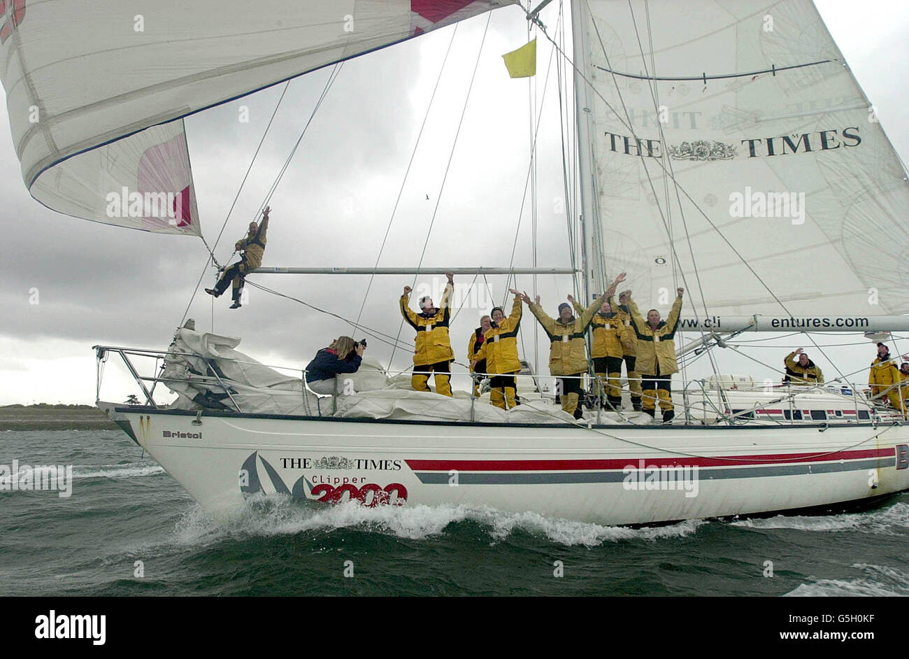 The crew of the Bristol Clipper celebrate crossing the finish line at ...