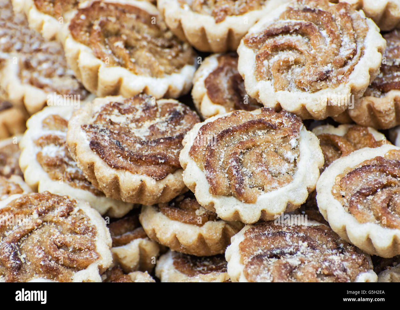Tasty cookies with caramel cream filling and sugar sprinkles. Food ...