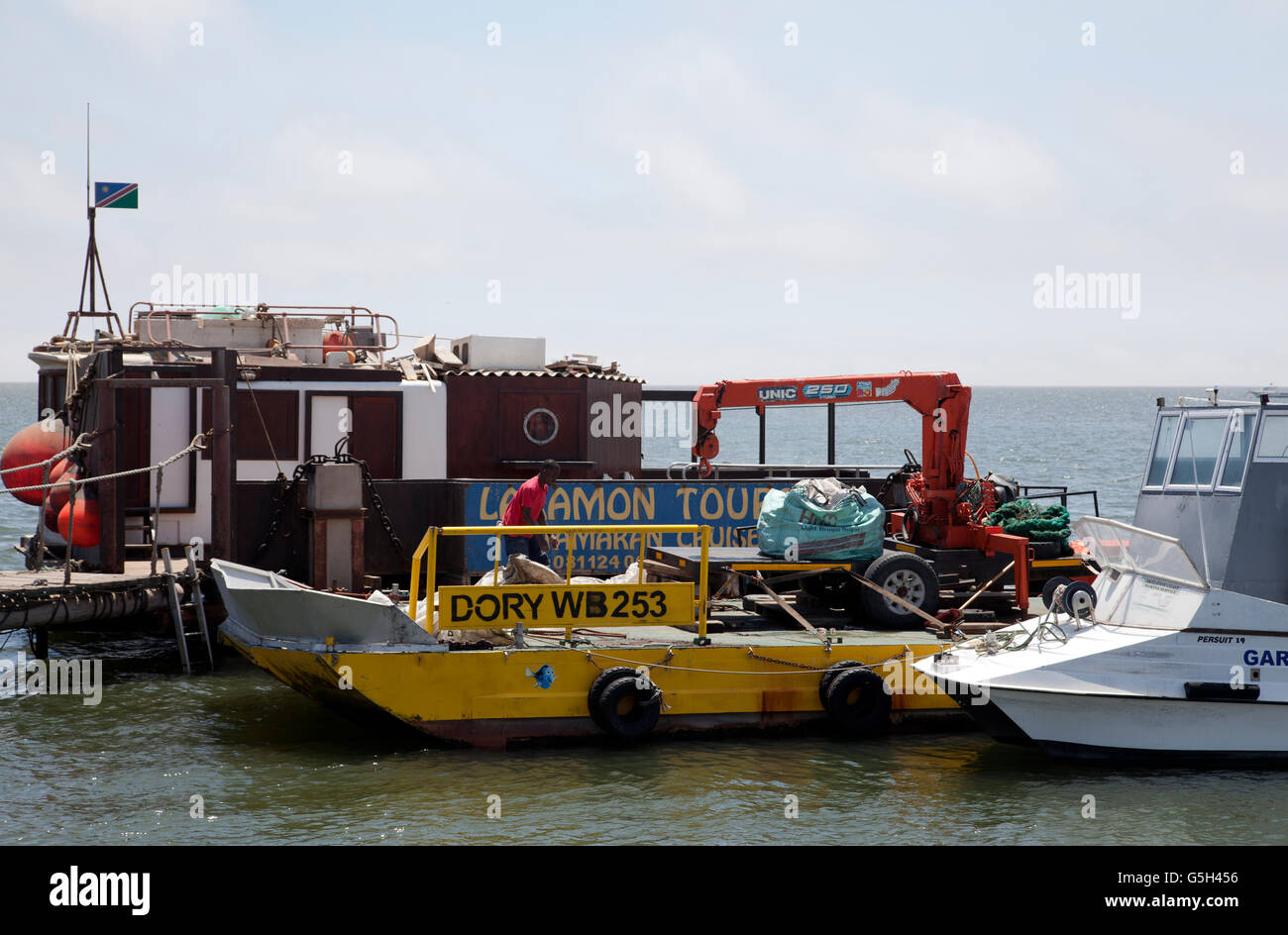 Cruise and Working Boats at Walvis Bay Waterfront in Namibia Stock ...