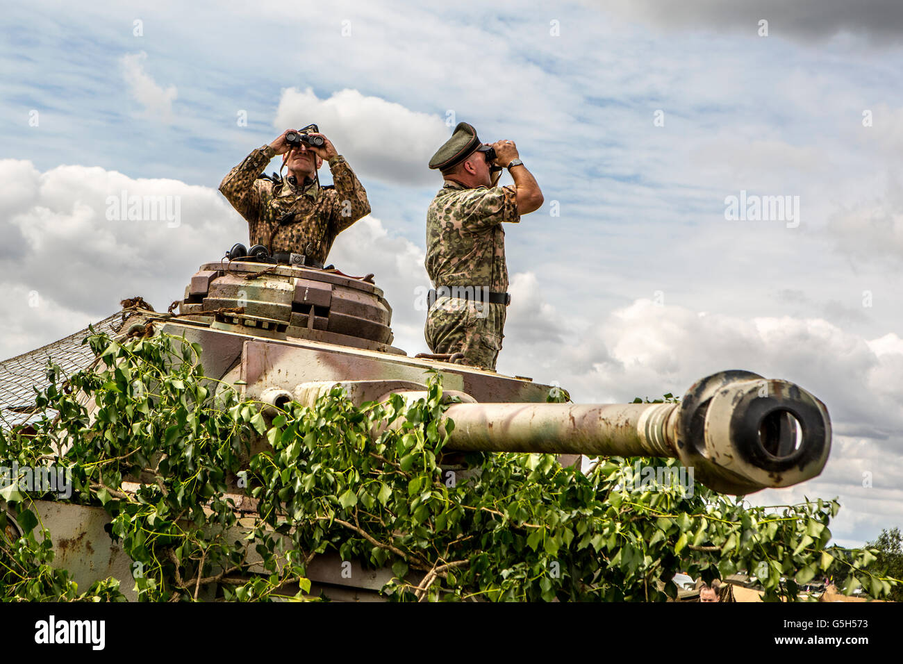 Two German soldiers on a tank at a reenactment Stock Photo - Alamy