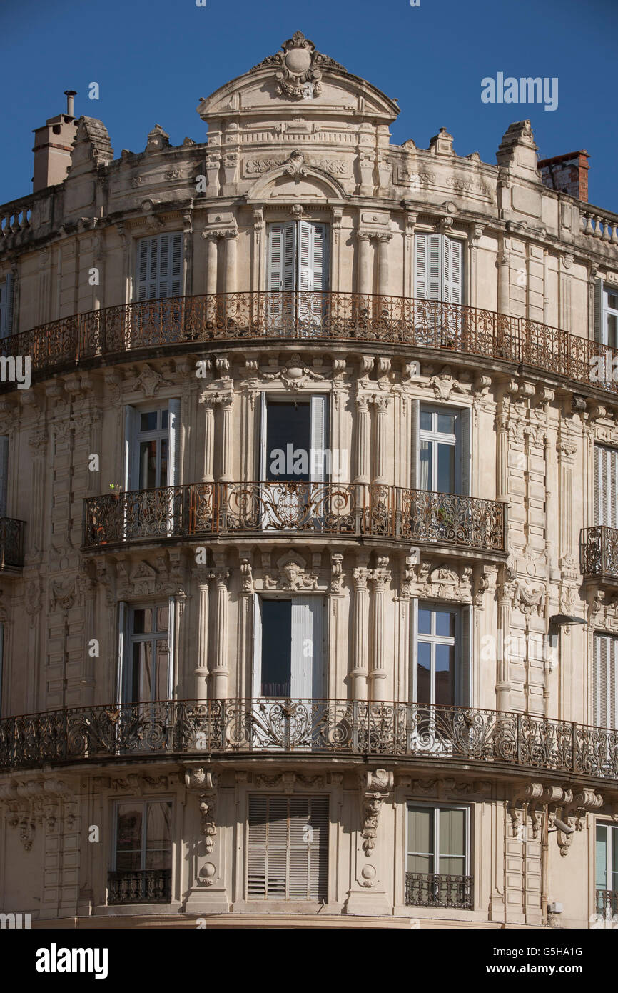 Architecture of apartments with ornate iron railings on Rue Foch in ...