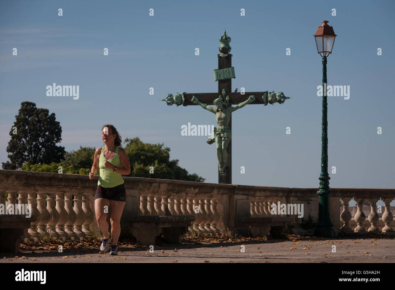Woman crucified hi-res stock photography and images - Alamy