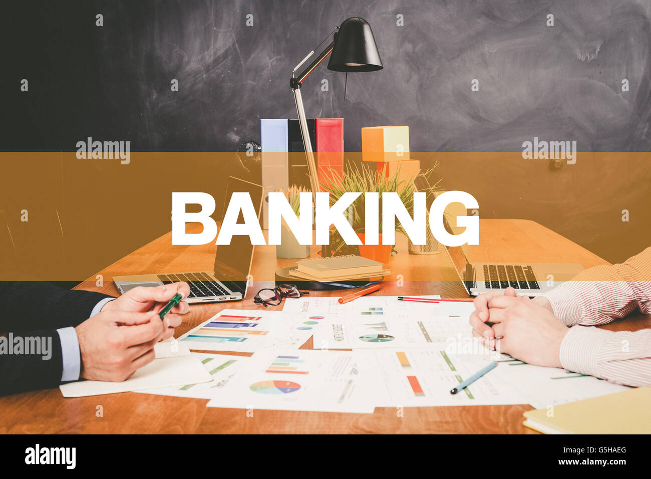 Two Businessman Banking working in an office Stock Photo - Alamy