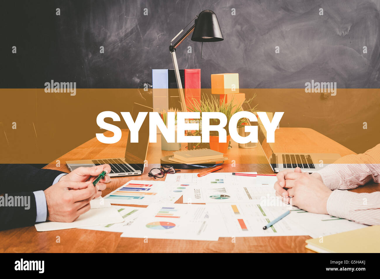 Two Businessman Synergy working in an office Stock Photo - Alamy