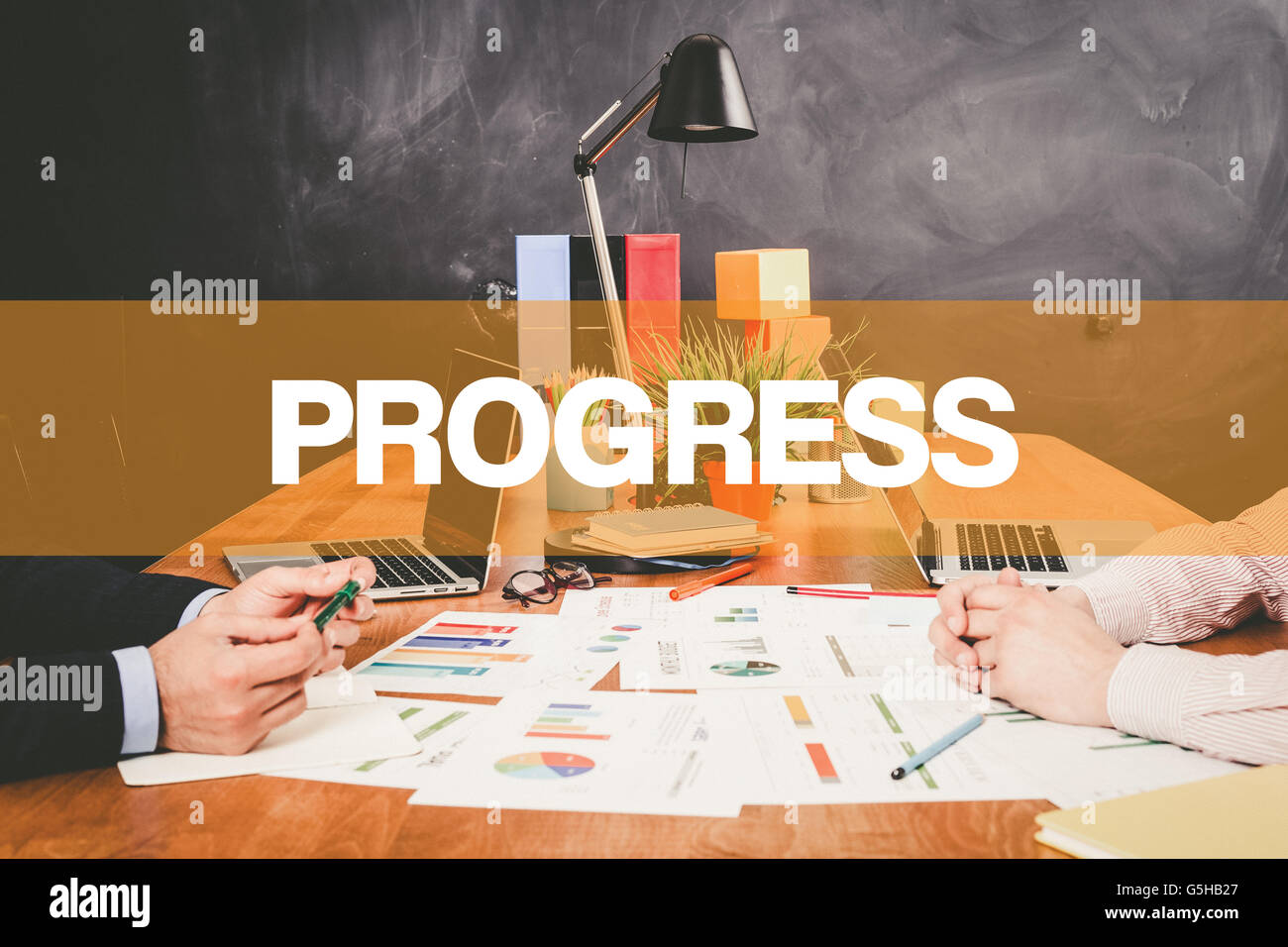 Two Businessman Progress working in an office Stock Photo - Alamy