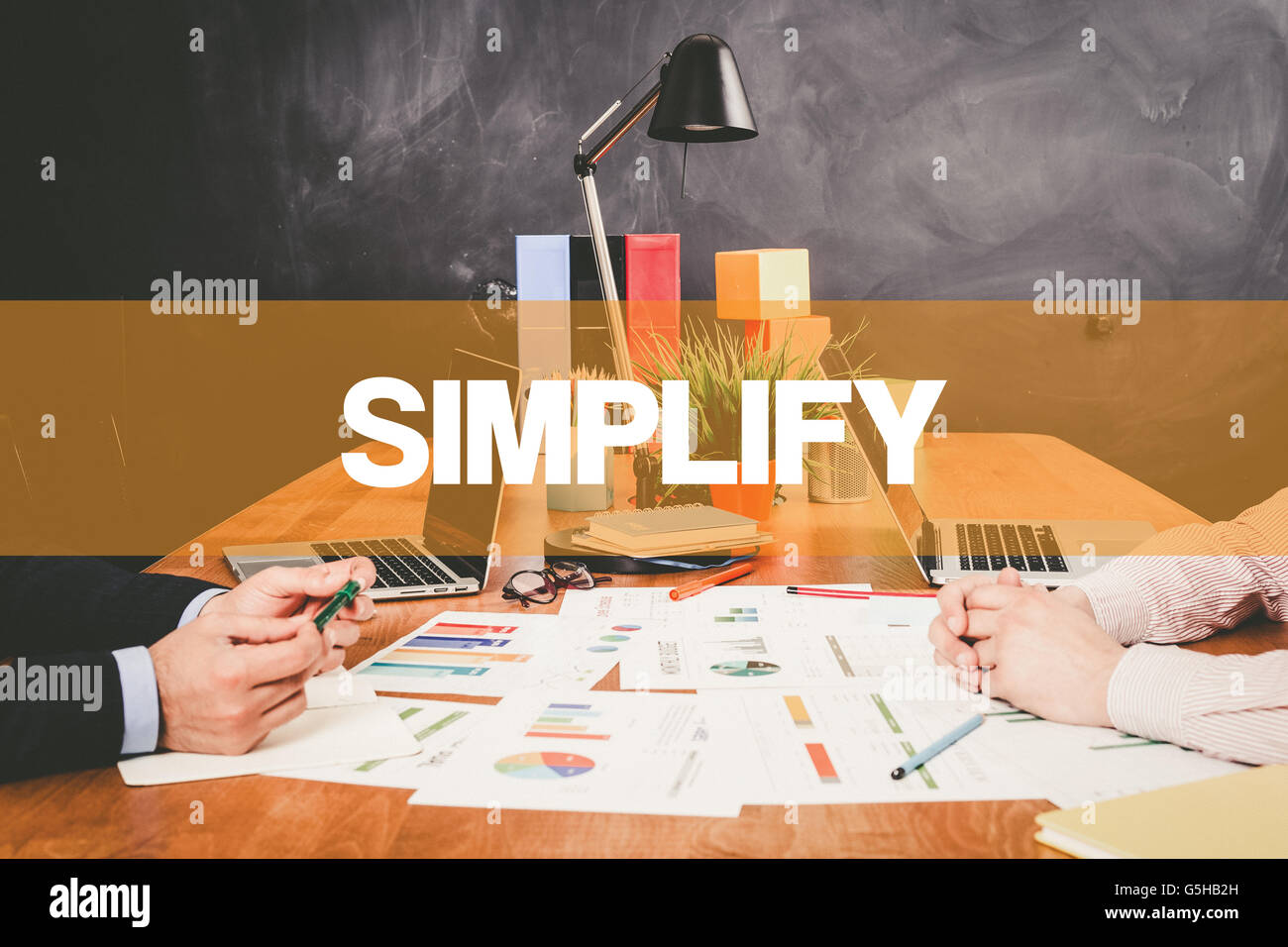 Two Businessman Simplify working in an office Stock Photo - Alamy