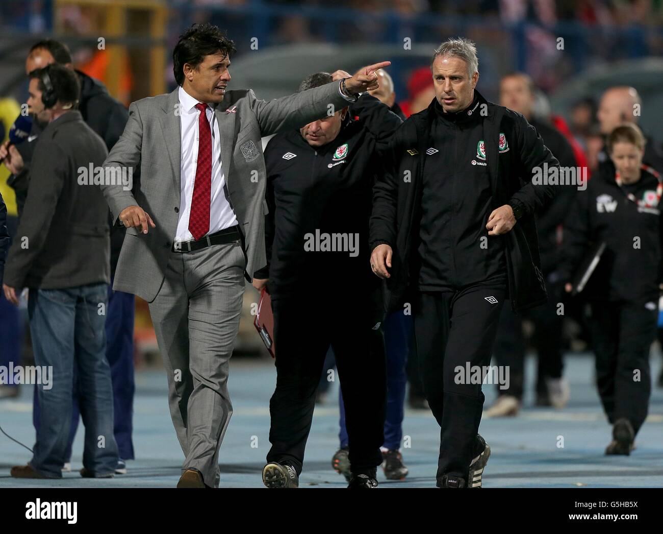 Wales manager Chris Coleman (left), coach Osian Roberts (centre) and ...