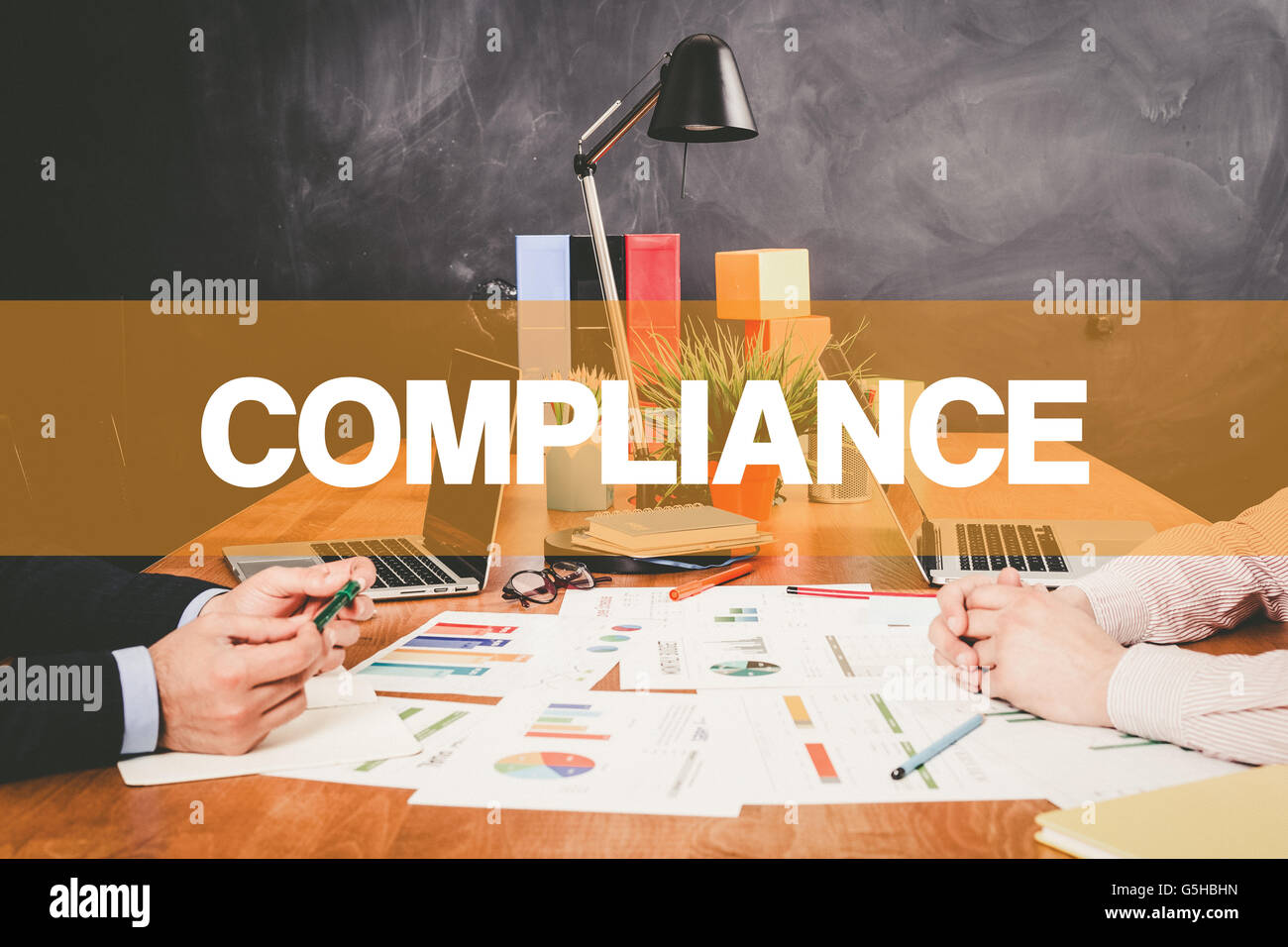 Two Businessman Compliance working in an office Stock Photo - Alamy