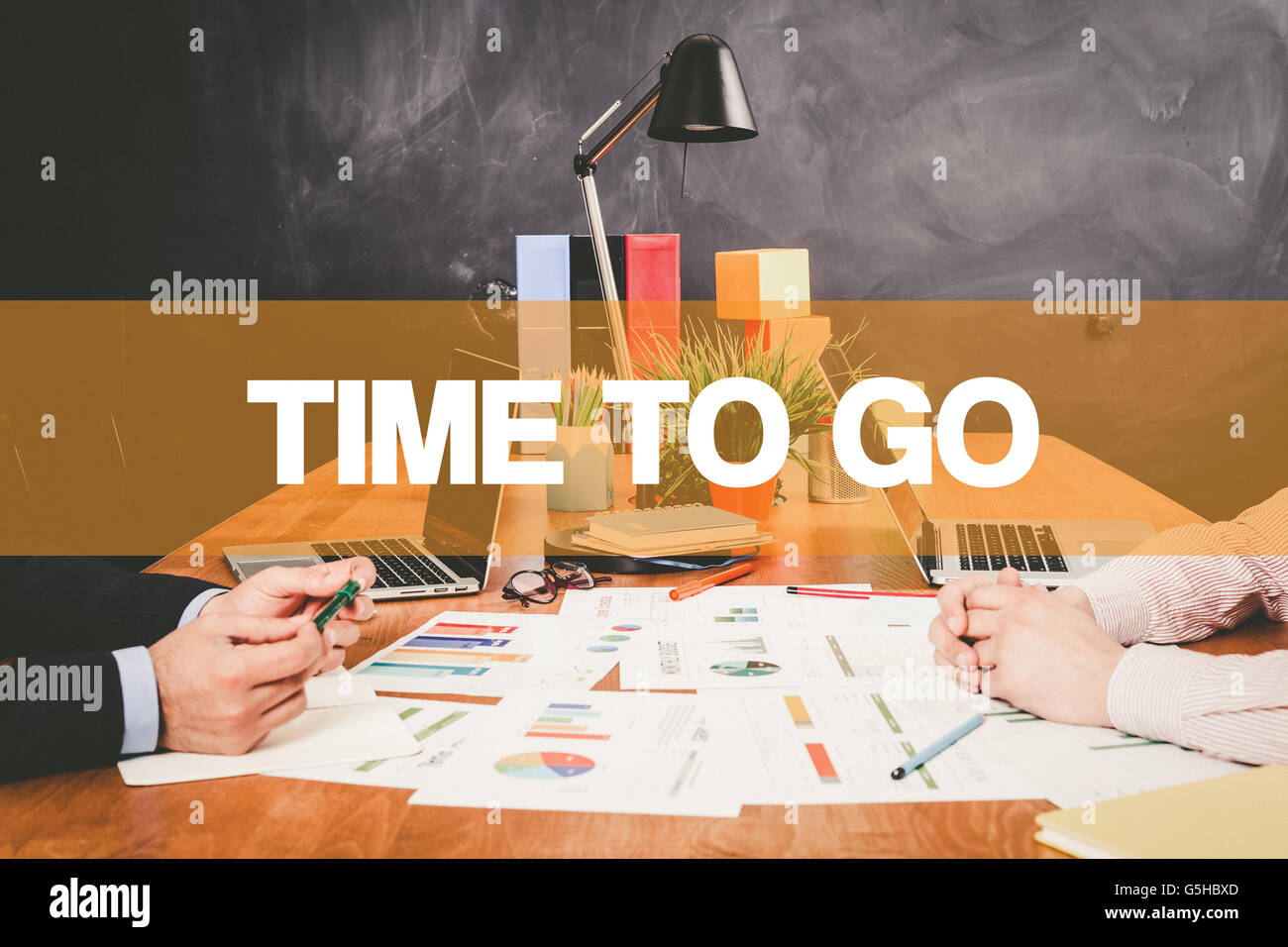 Two Businessman Time To Go working in an office Stock Photo - Alamy