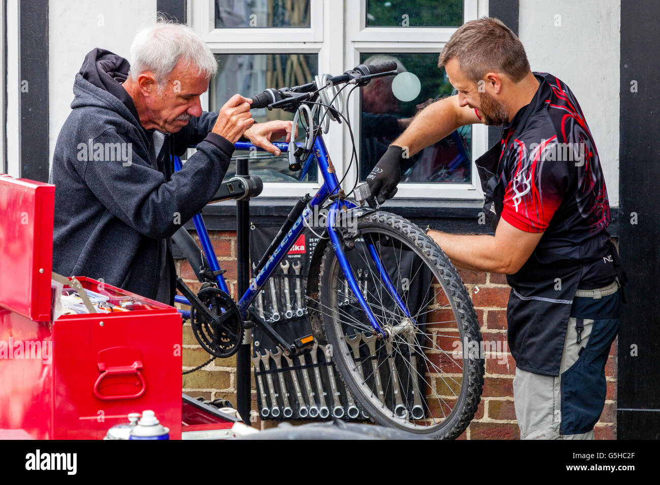Repairing a bicycle hi-res stock photography and images - Alamy