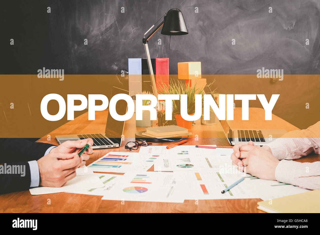 Two Businessman Opportunity working in an office Stock Photo - Alamy