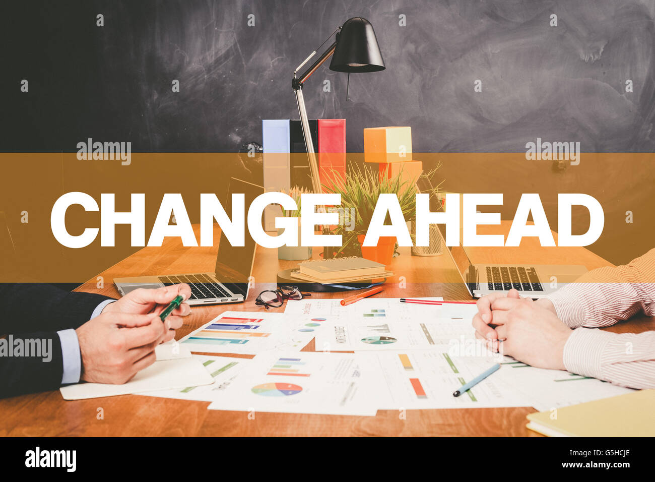 Two Businessman Change Ahead working in an office Stock Photo - Alamy