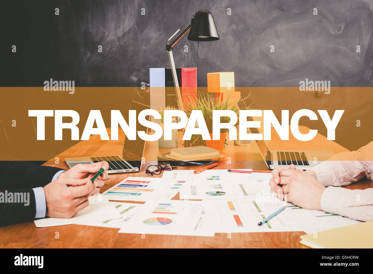Two Businessman Transparency working in an office Stock Photo - Alamy