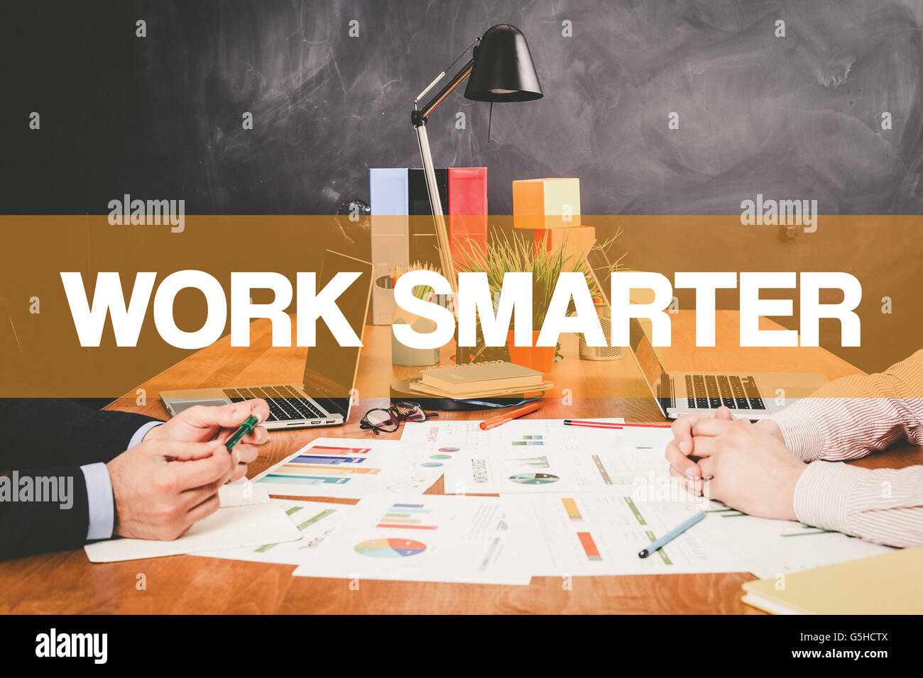 Two Businessman Work Smarter working in an office Stock Photo - Alamy