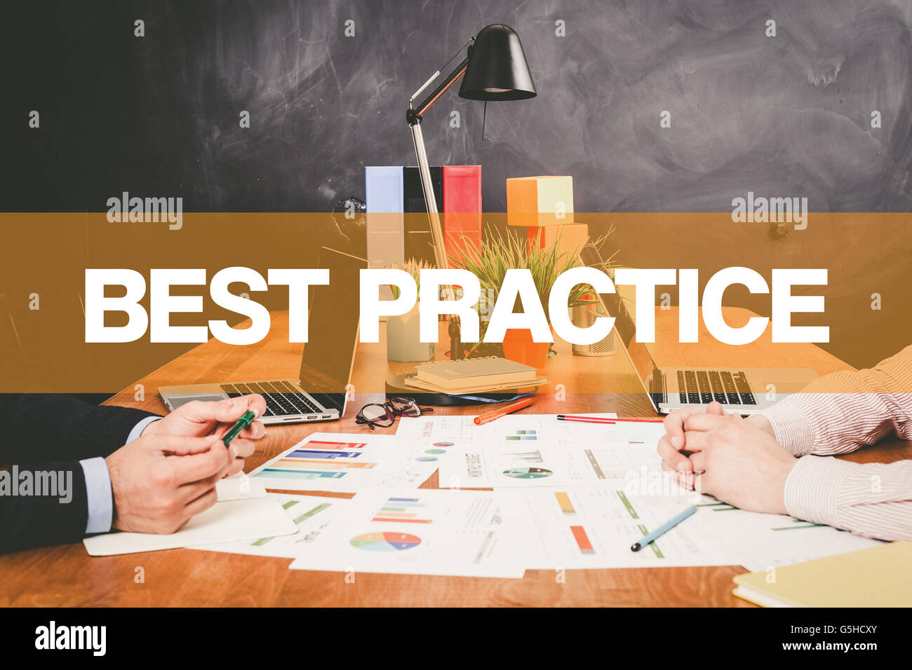 Two Businessman Best Practice working in an office Stock Photo - Alamy