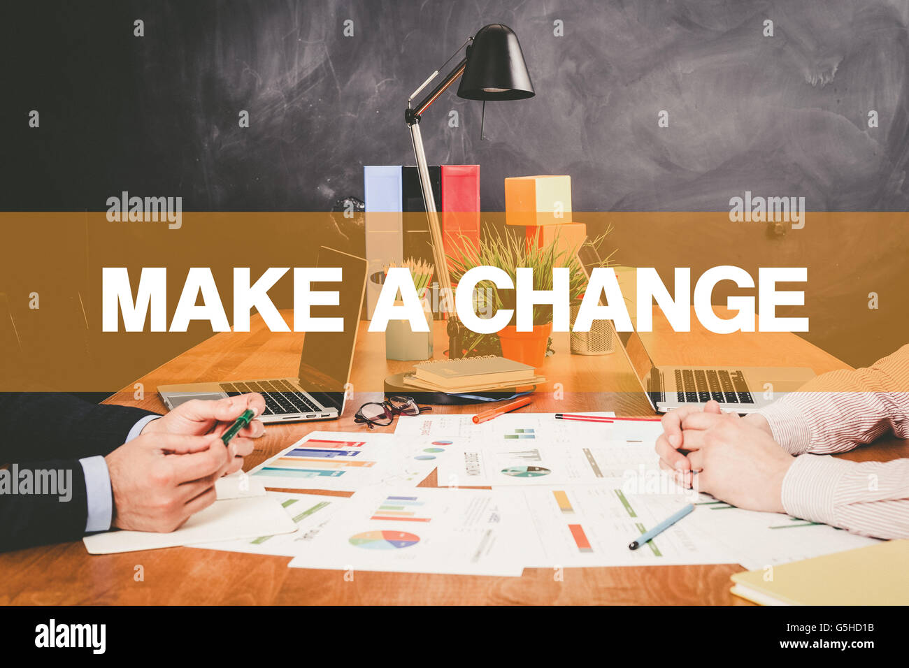 Two Businessman Make A Change working in an office Stock Photo - Alamy