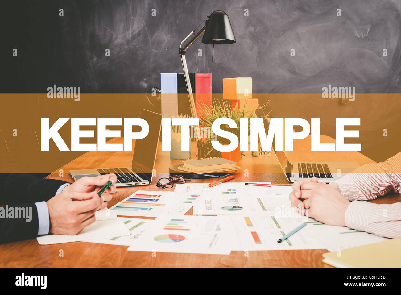 Two Businessman Keep it Simple working in an office Stock Photo - Alamy