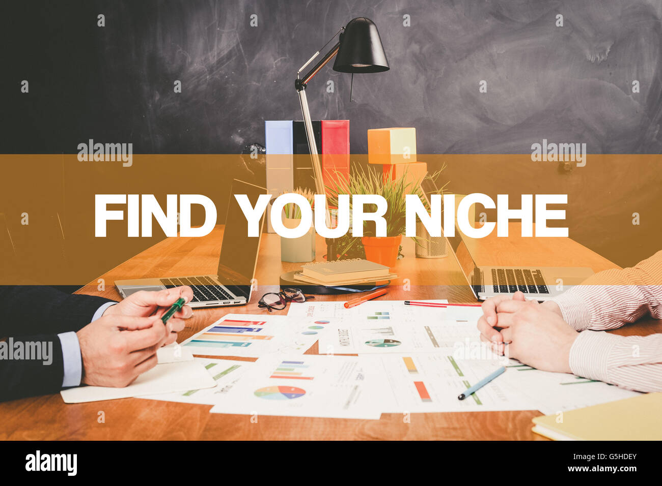 Two Businessman Find Your Niche working in an office Stock Photo - Alamy